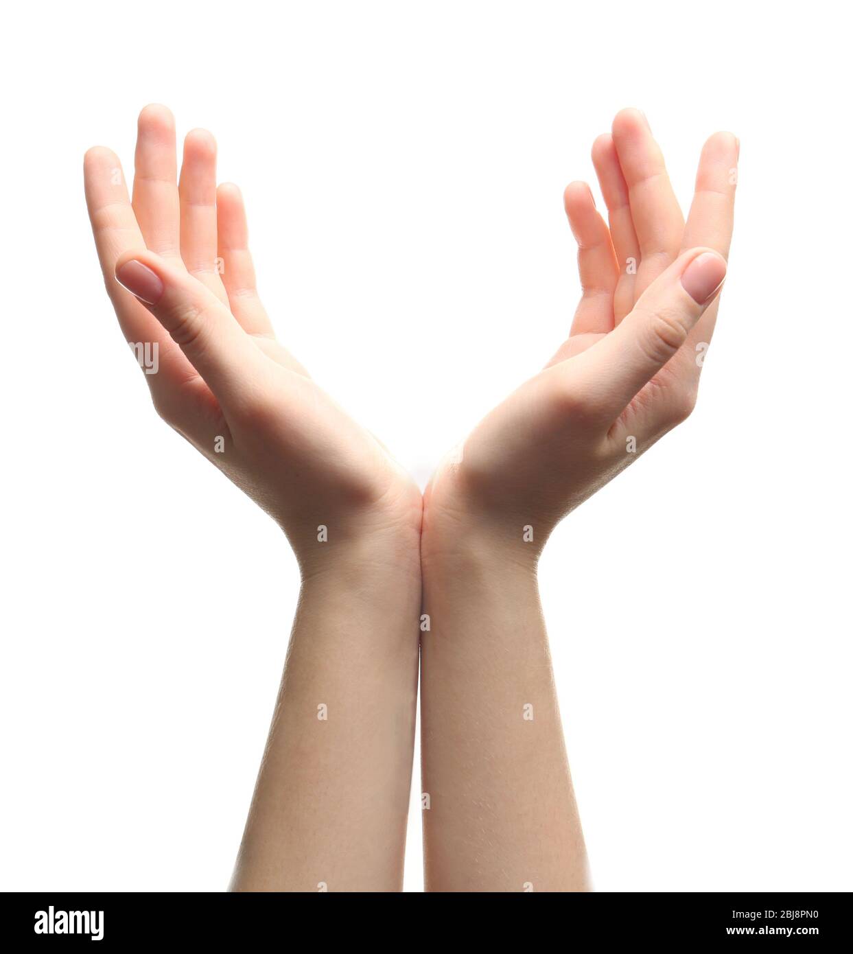 Two open female hands on white background Stock Photo - Alamy