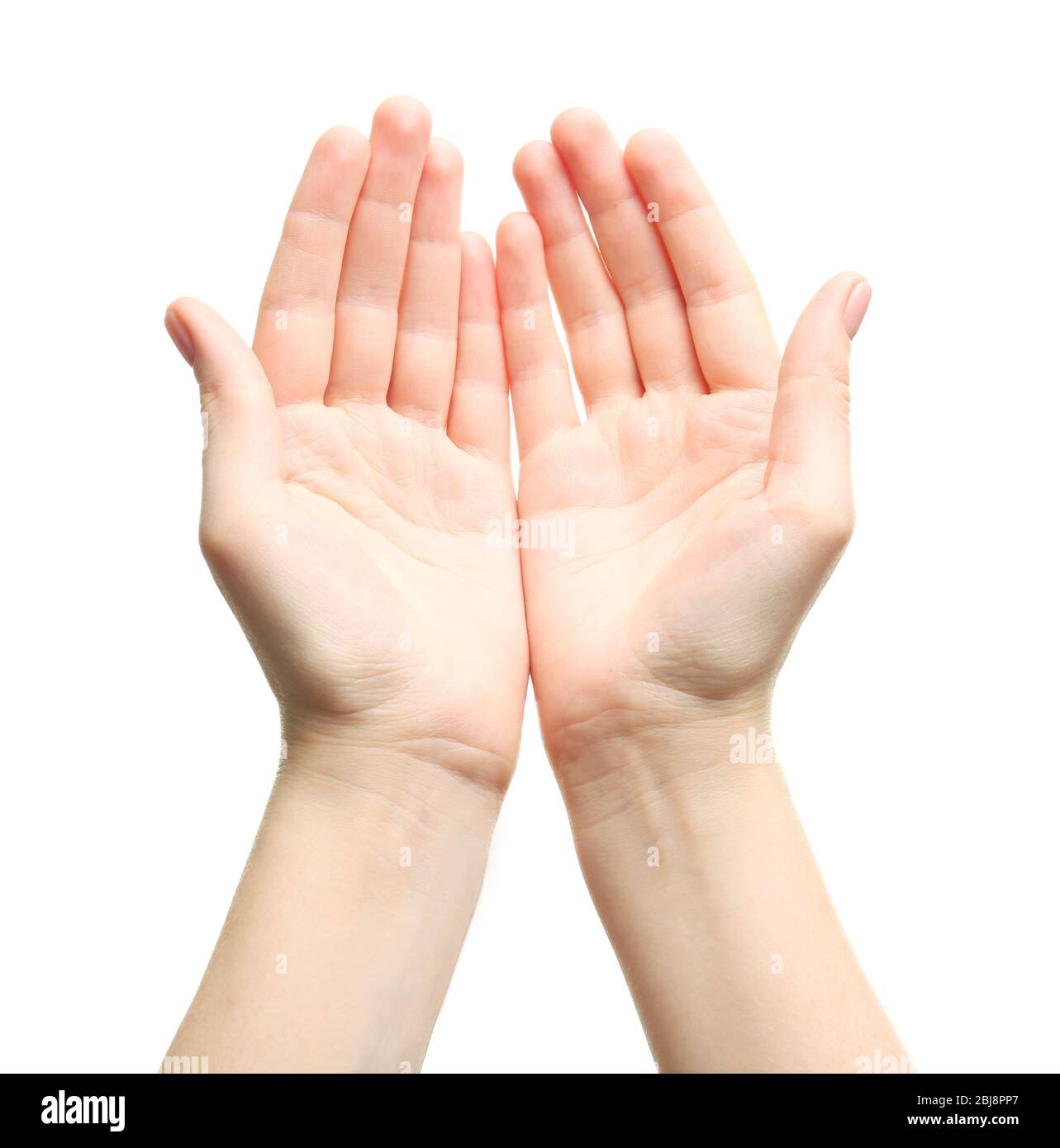 Two open female hands on white background Stock Photo - Alamy