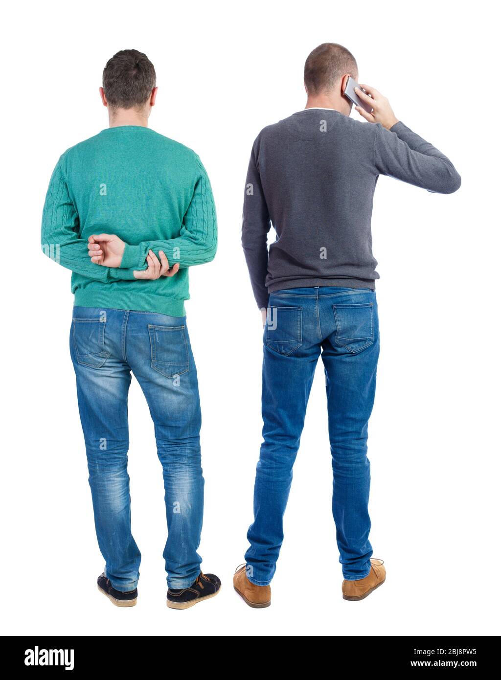 Back view of two man in sweater with mobile phone. Rear view people ...