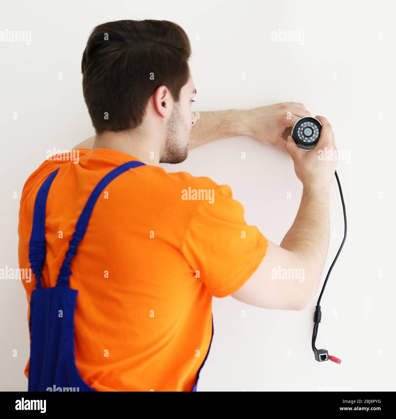 Professional Cctv Technician Working Stock Photo Alamy