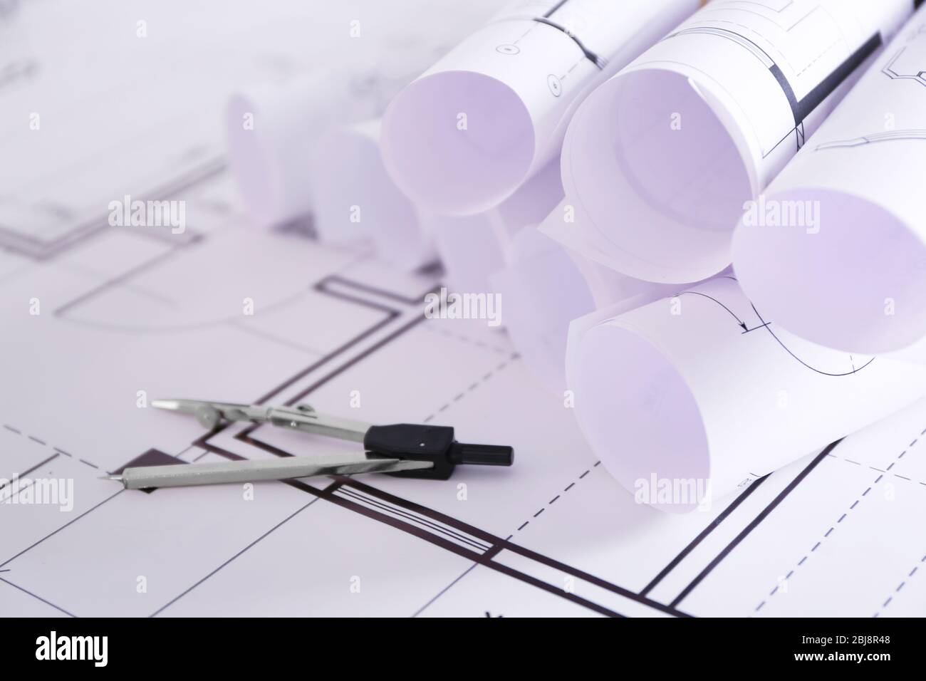 Set of construction blueprints with divider closeup Stock Photo - Alamy