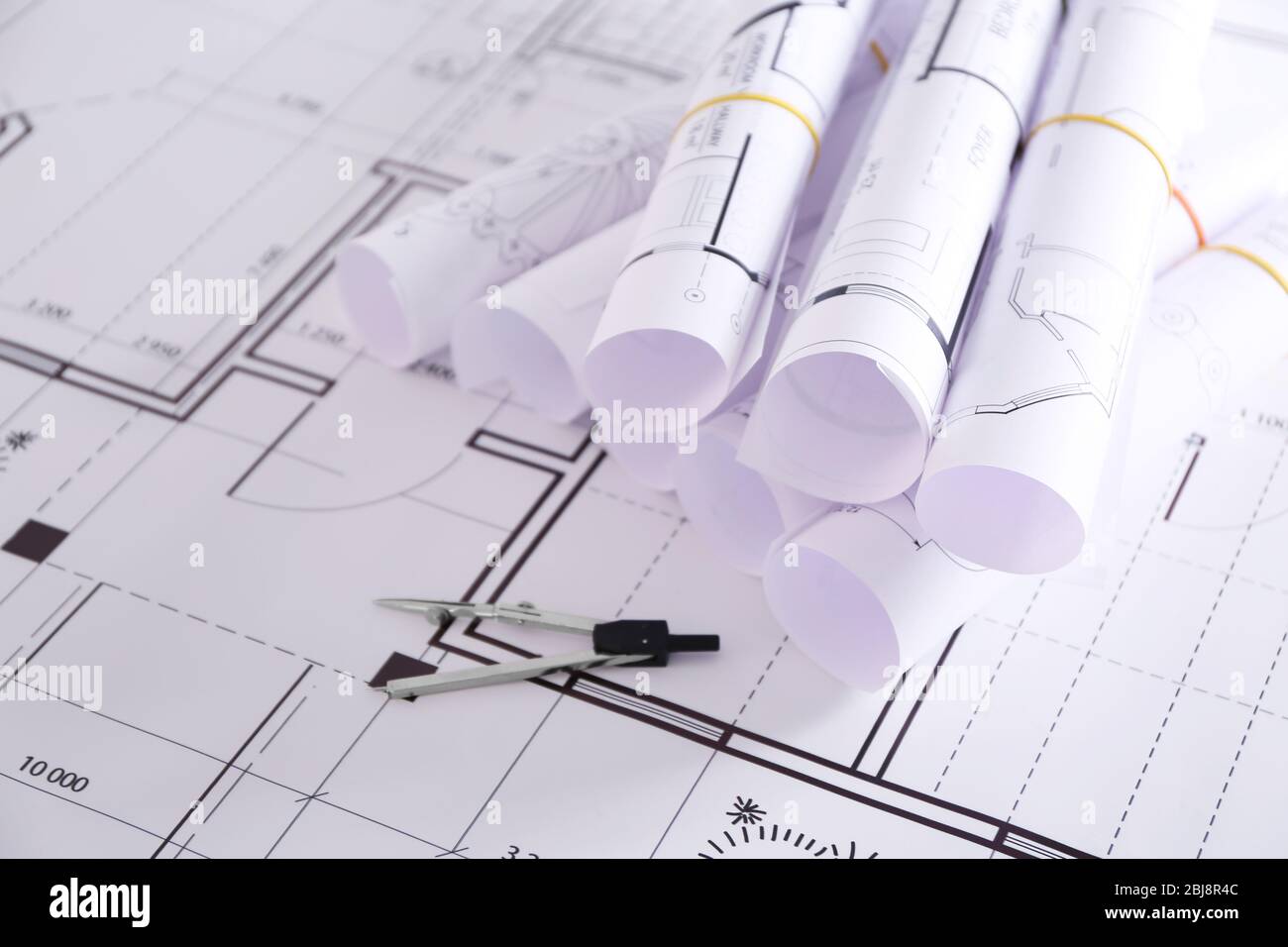 Set of construction blueprints with divider closeup Stock Photo - Alamy