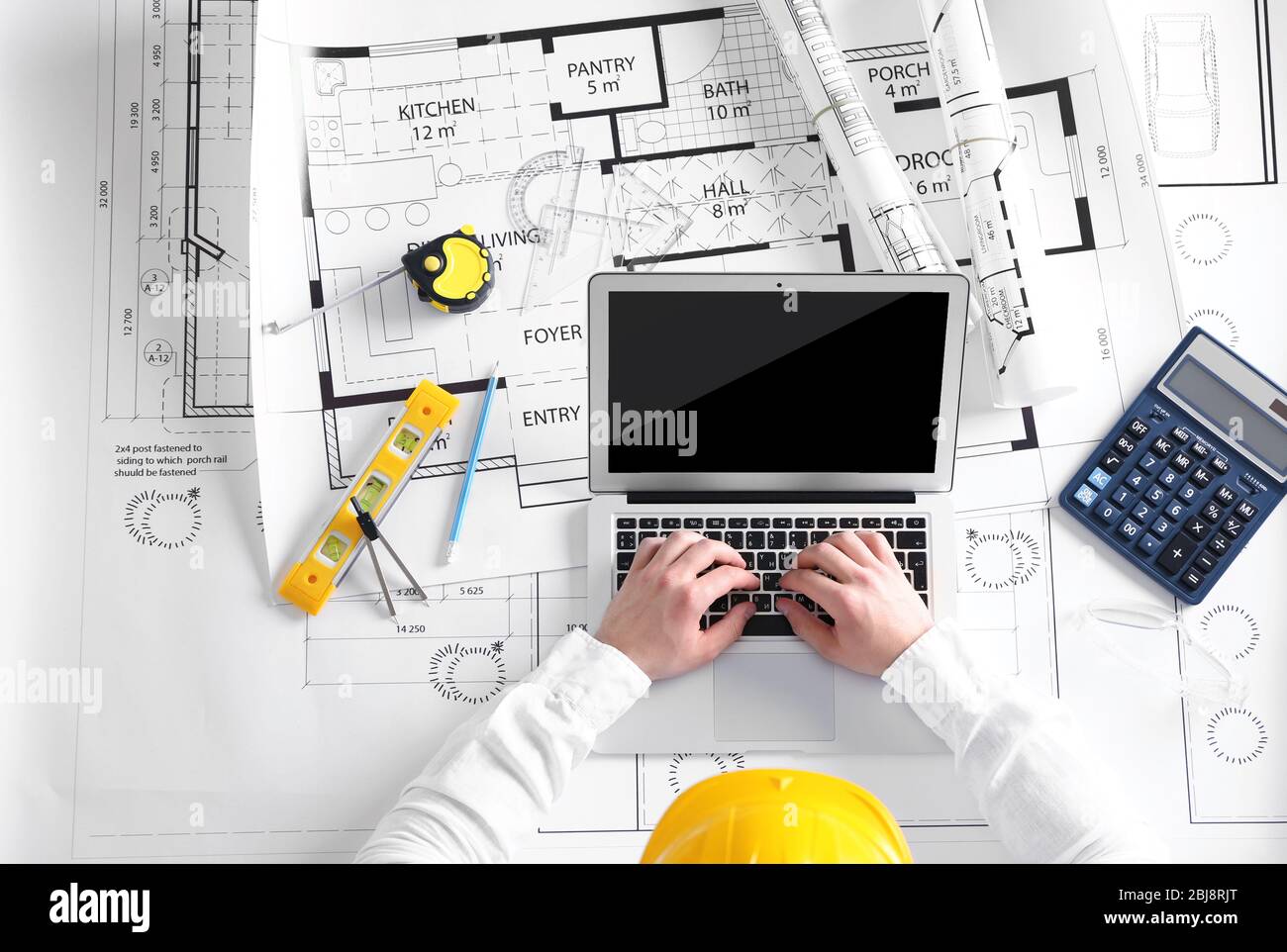 Architect sketching construction project, top view Stock Photo - Alamy