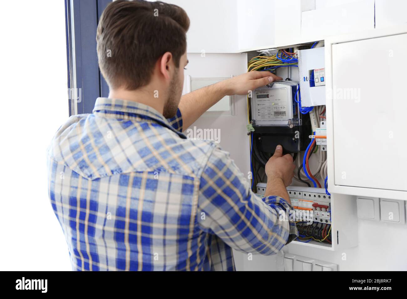 Man checking switch box closeup Stock Photo - Alamy Man checking switch box closeup Stock Photo - Alamy