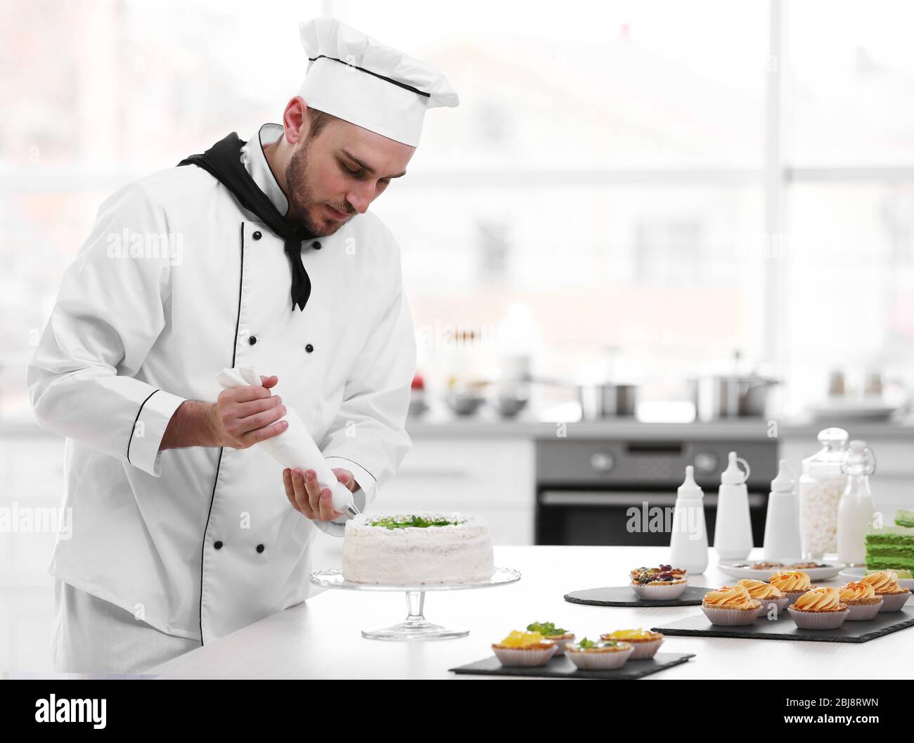 Male chef holding glass hi-res stock photography and images - Alamy