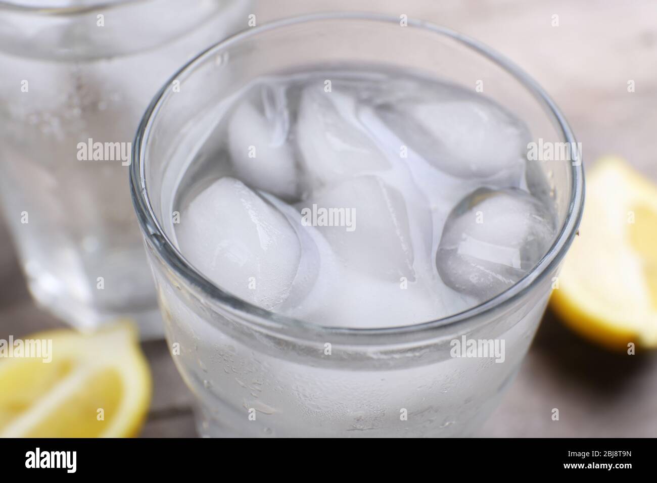 Glass of water with ice, close up Stock Photo - Alamy