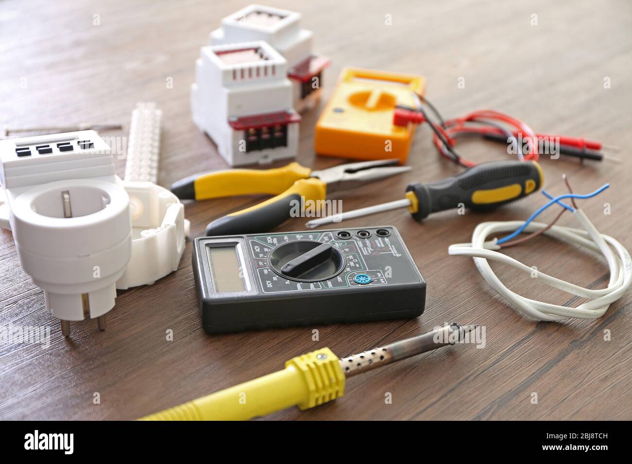 Different electrical tools on wooden table, top view Stock Photo - Alamy