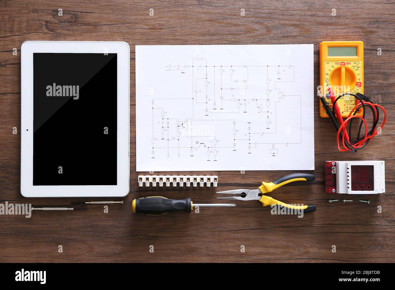 Electrical drawings, tablet and tools on wooden table, top view Stock ...