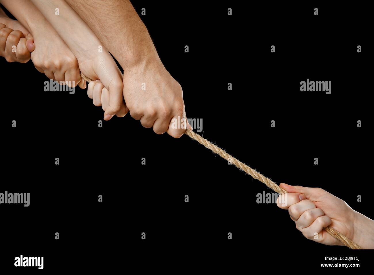 Rope hands pulling together hi-res stock photography and images - Alamy