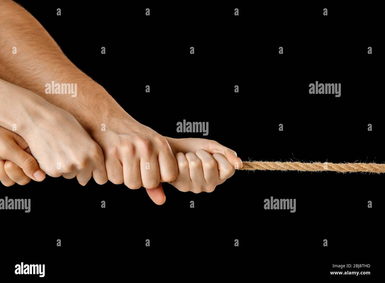 Rope hands pulling together hi-res stock photography and images - Alamy