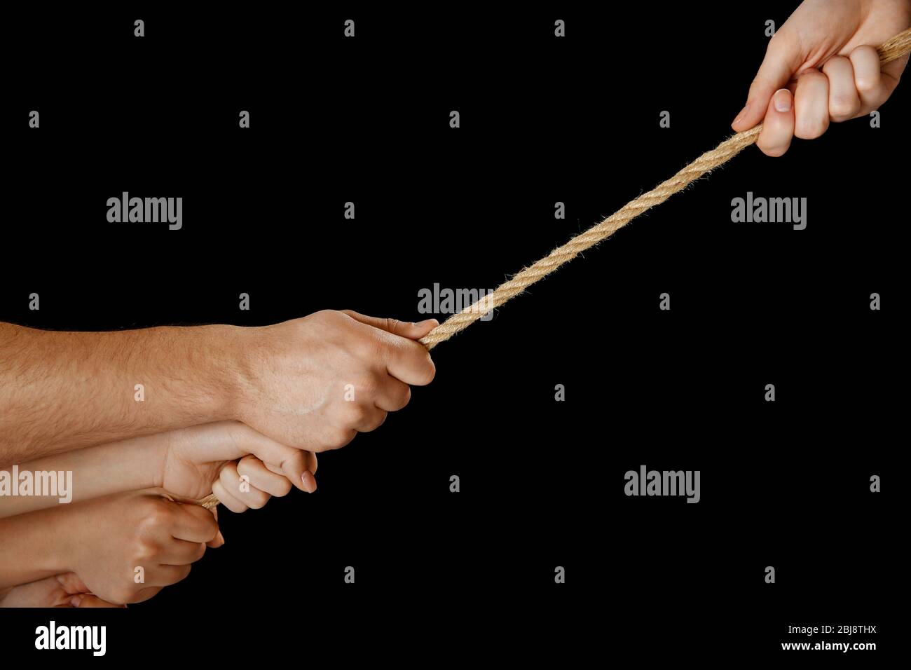 Rope hands pulling together hi-res stock photography and images - Alamy