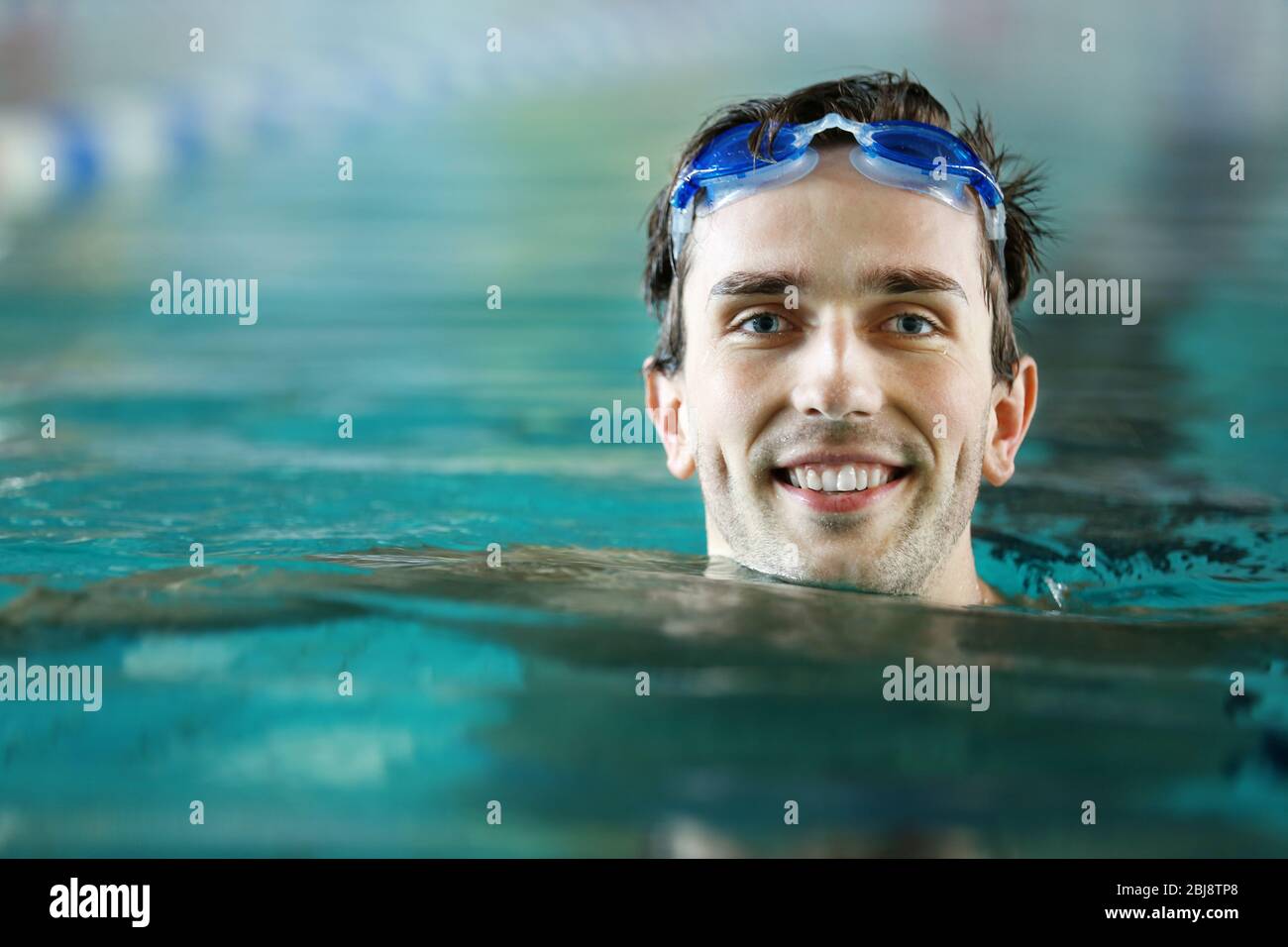 Head of handsome man in the swimming pool Stock Photo - Alamy