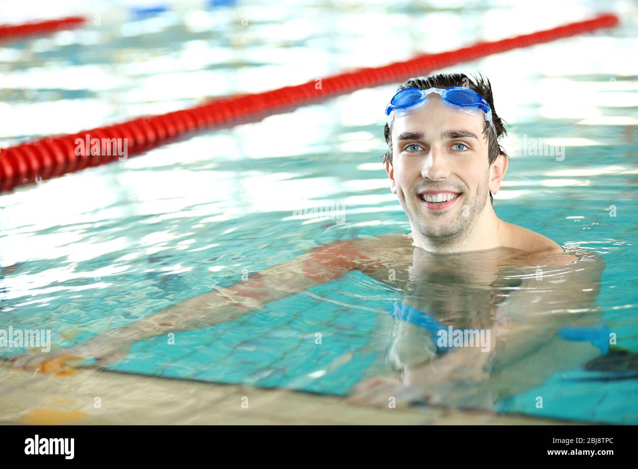 Handsome sporty man in the swimming pool Stock Photo - Alamy