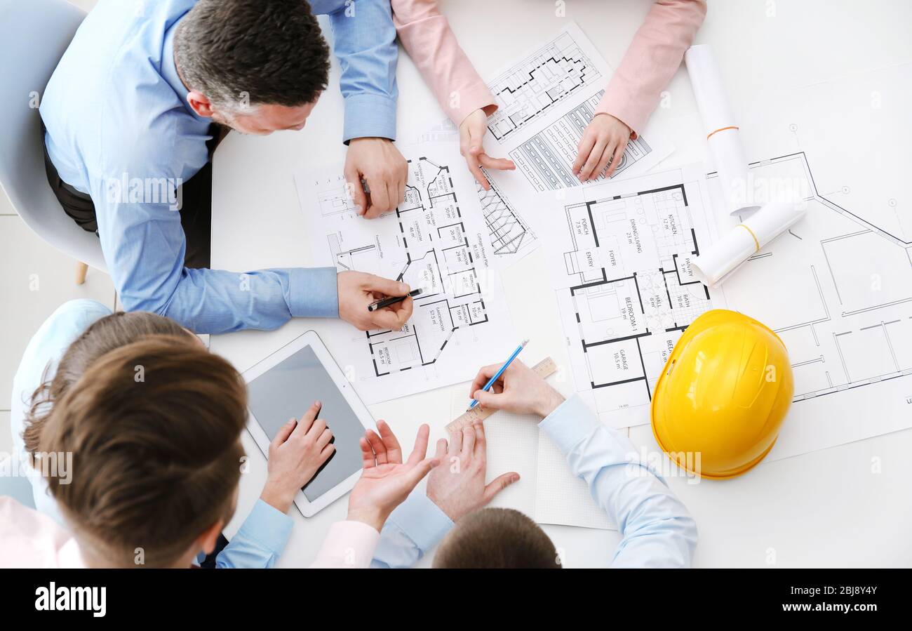 Young engineers working in the office, top view Stock Photo - Alamy