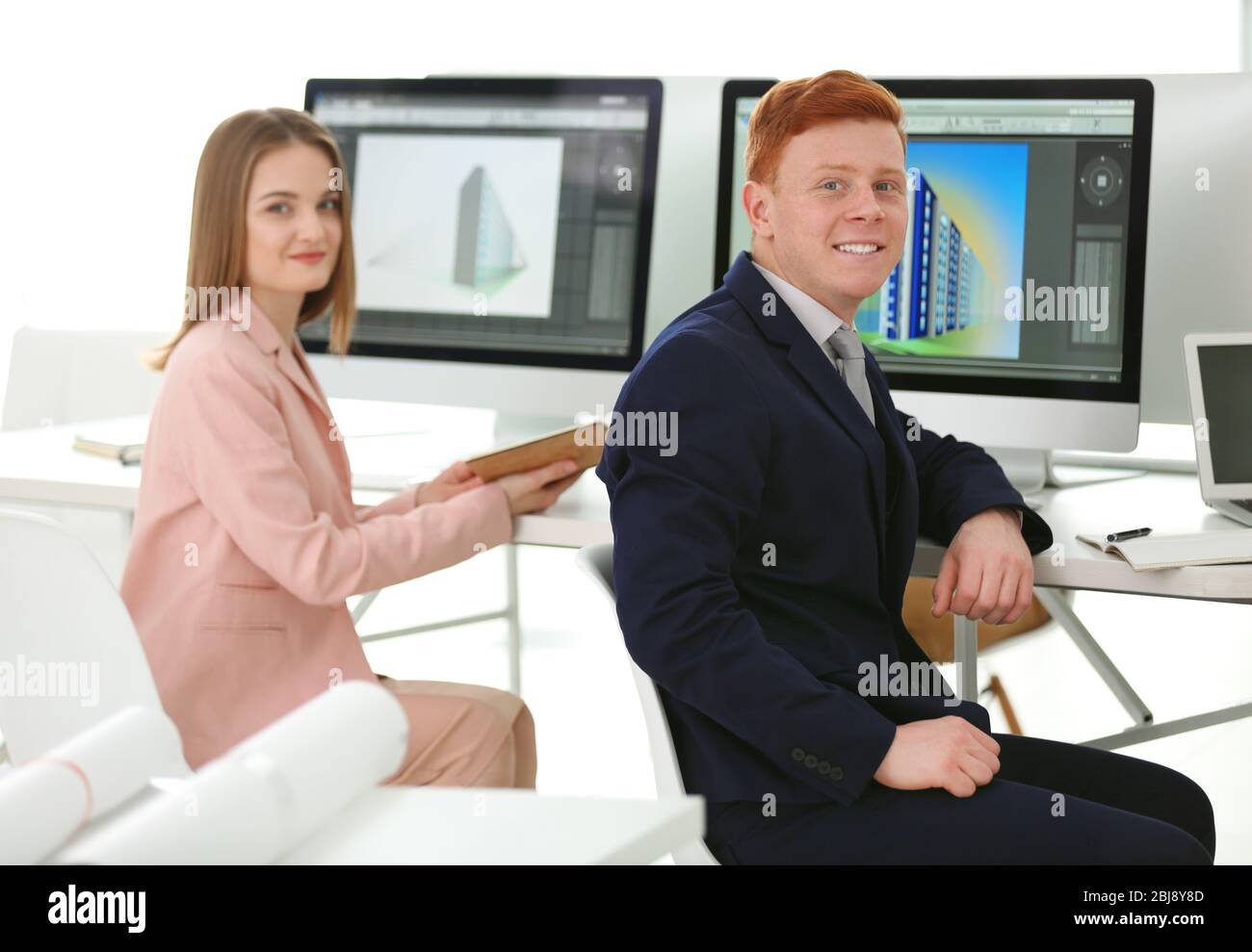 Young engineer working in the office Stock Photo - Alamy