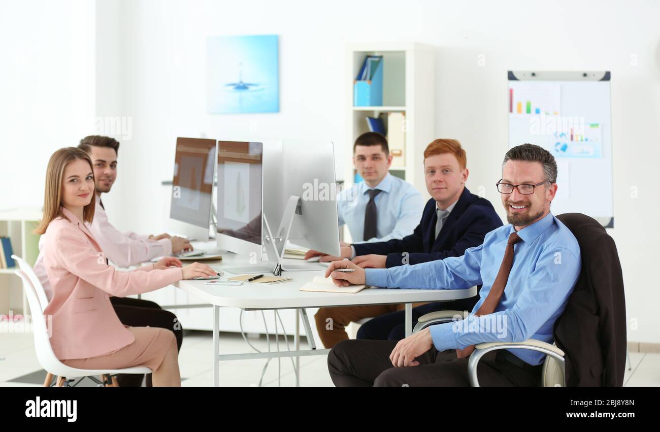 Young engineers working in the office Stock Photo - Alamy
