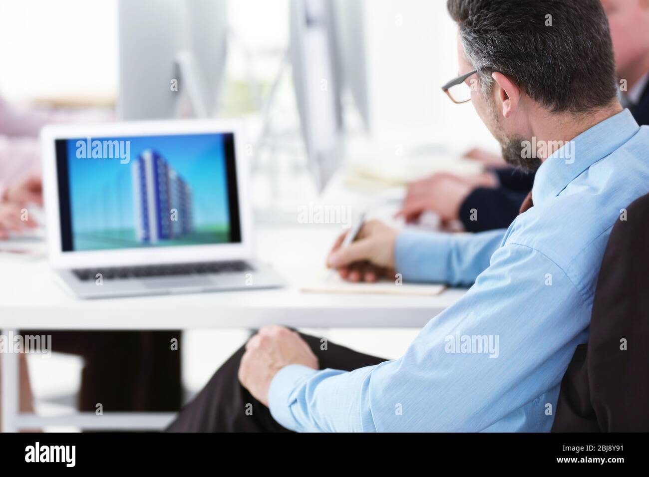 Chief Engineer working in office Stock Photo - Alamy