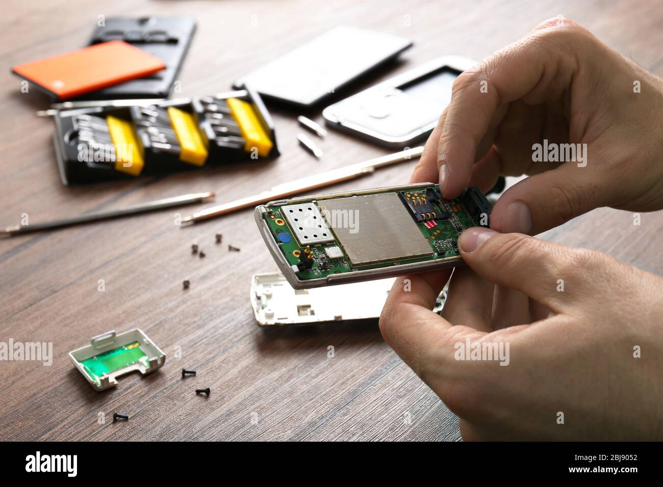 Mobile phone repair, closeup Stock Photo - Alamy