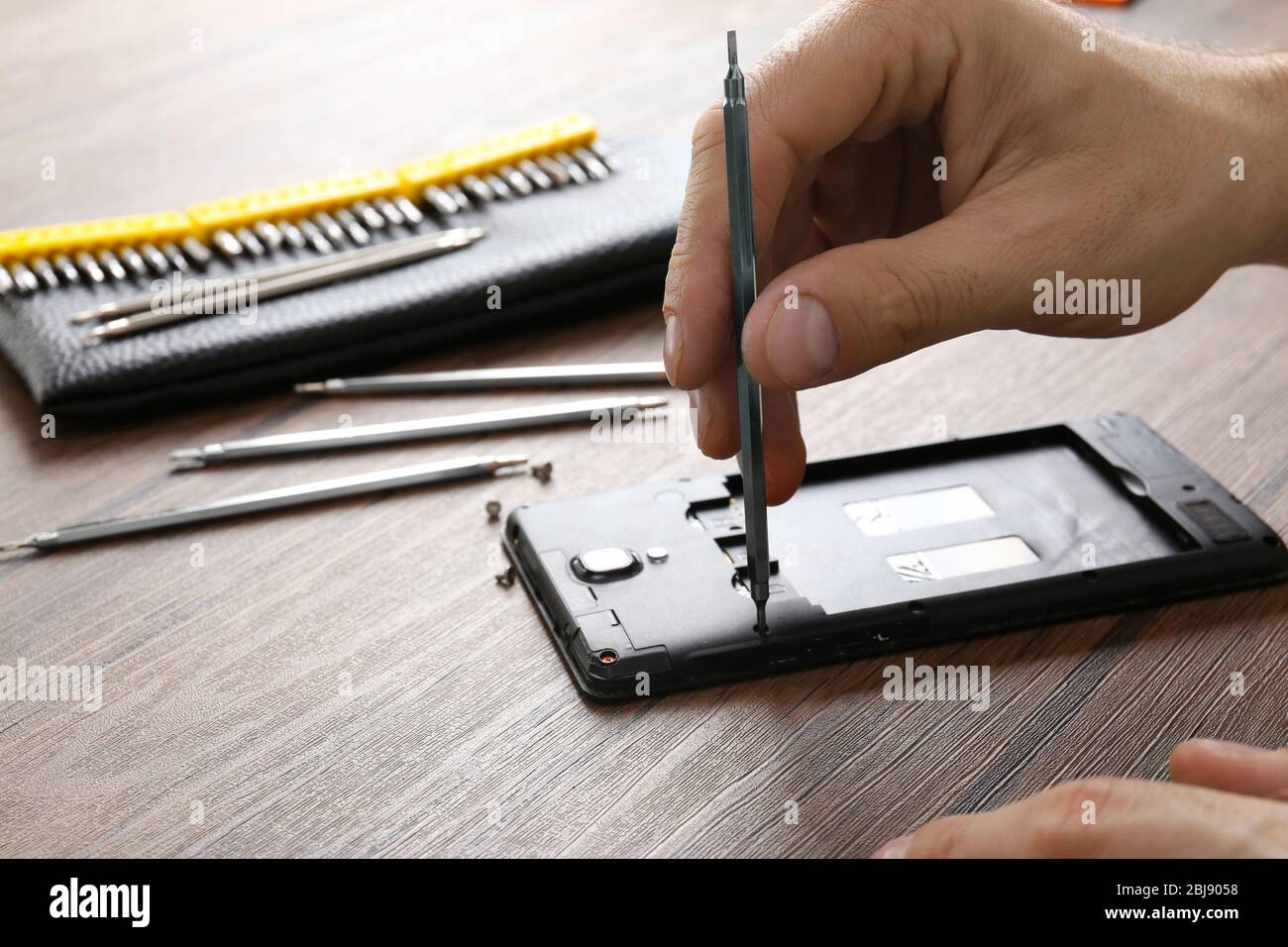 Mobile phone repair, closeup Stock Photo - Alamy