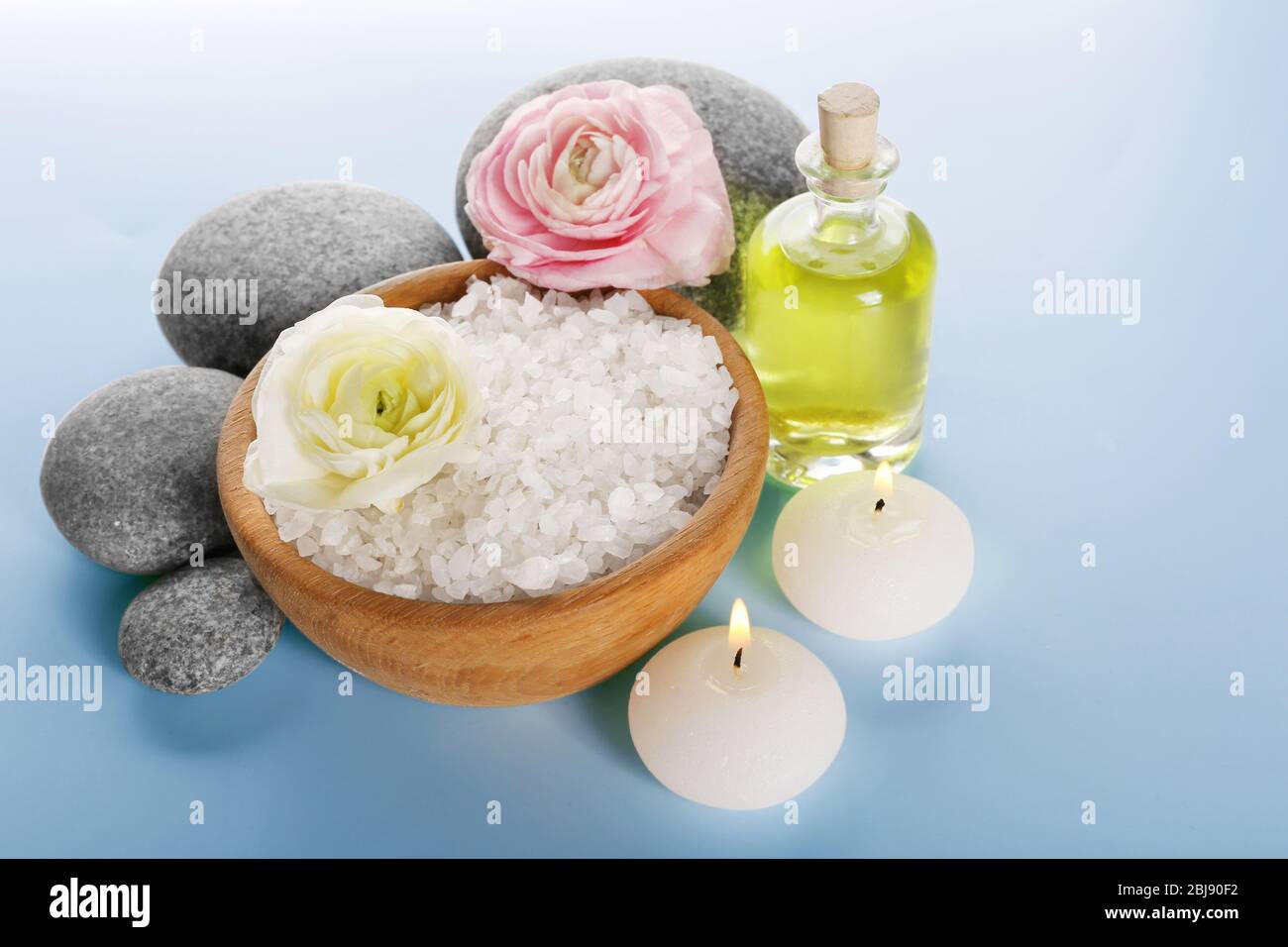 Spa still life with pebbles and candle isolated on white Stock Photo ...