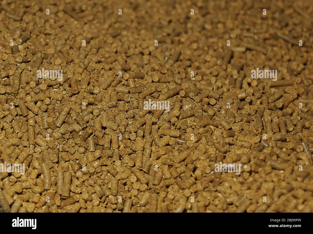 Solid fuel pellets background Stock Photo - Alamy