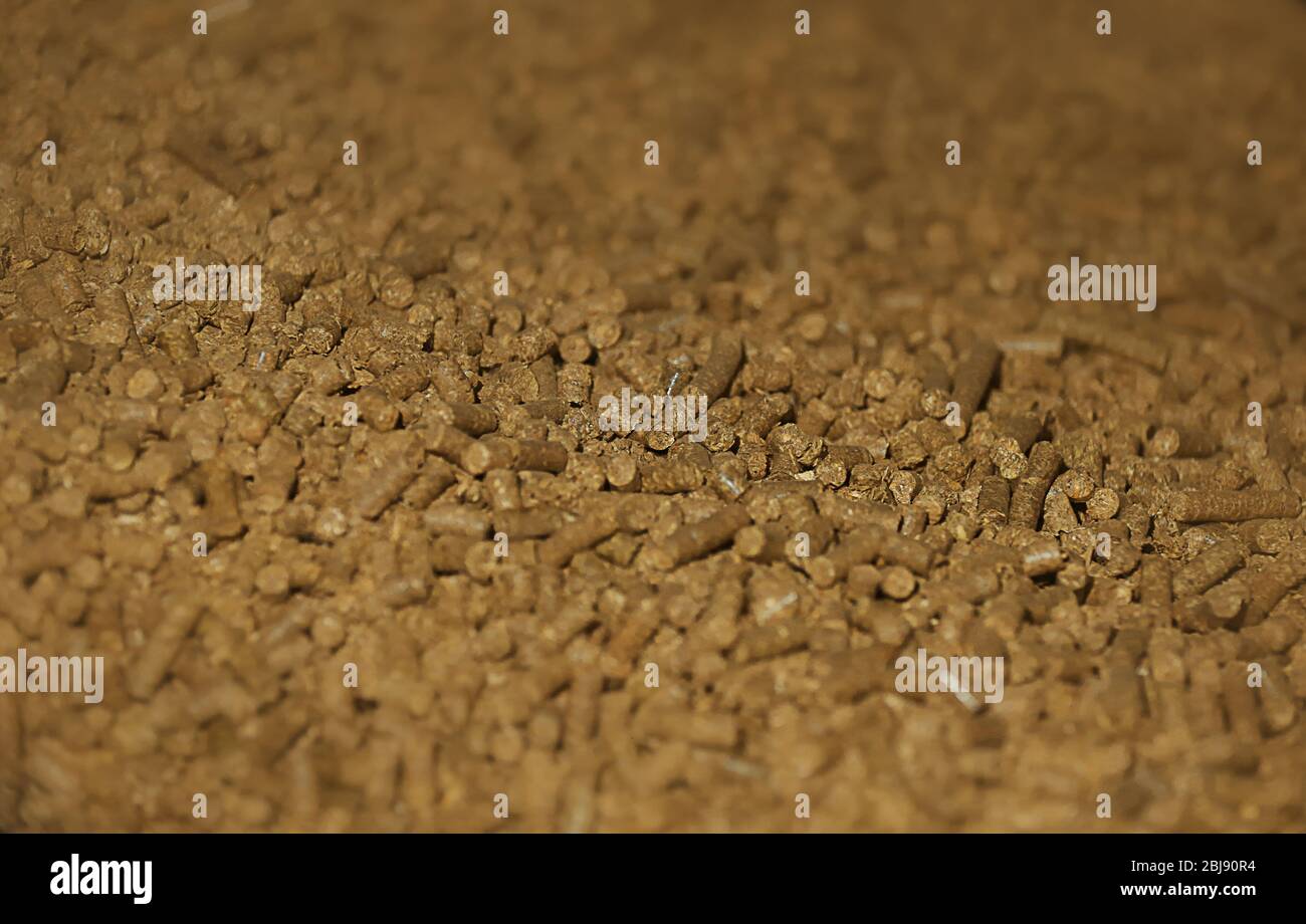 Solid fuel pellets background Stock Photo - Alamy