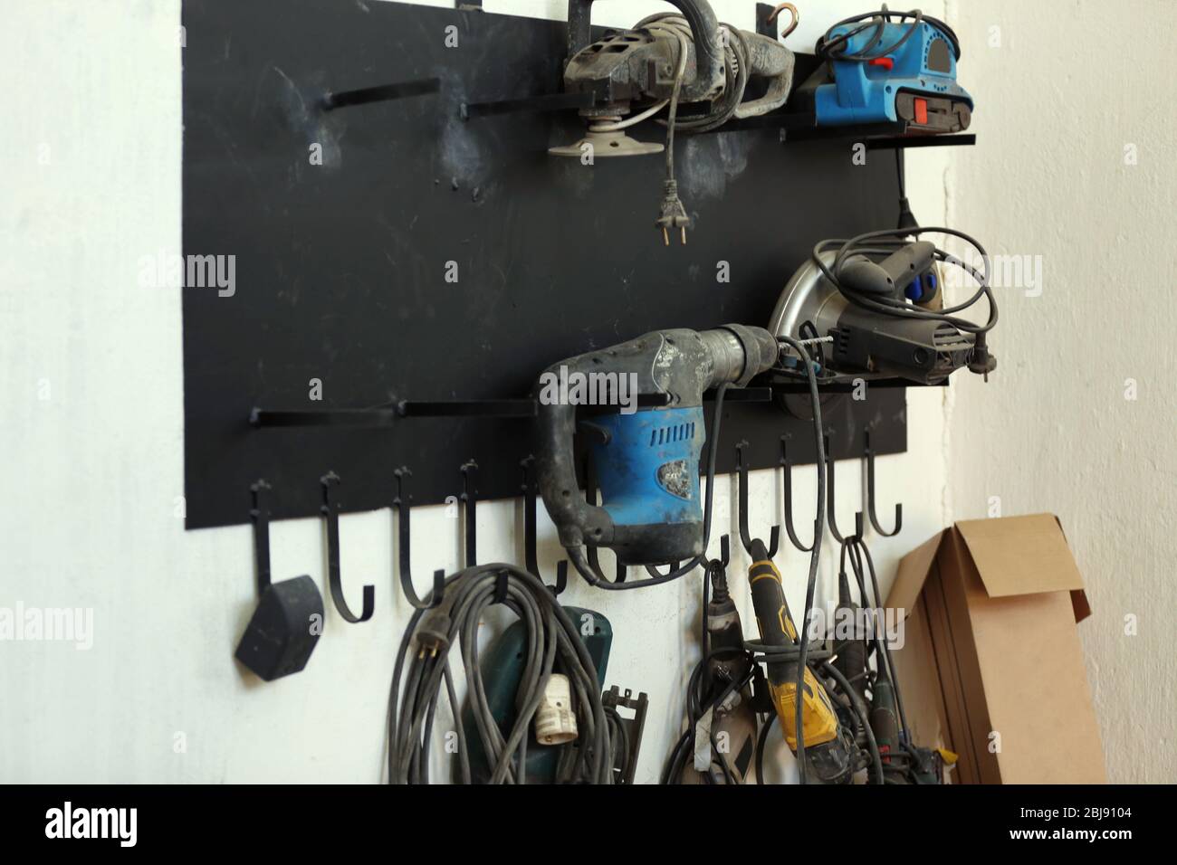 Set of working instrument in garage Stock Photo - Alamy