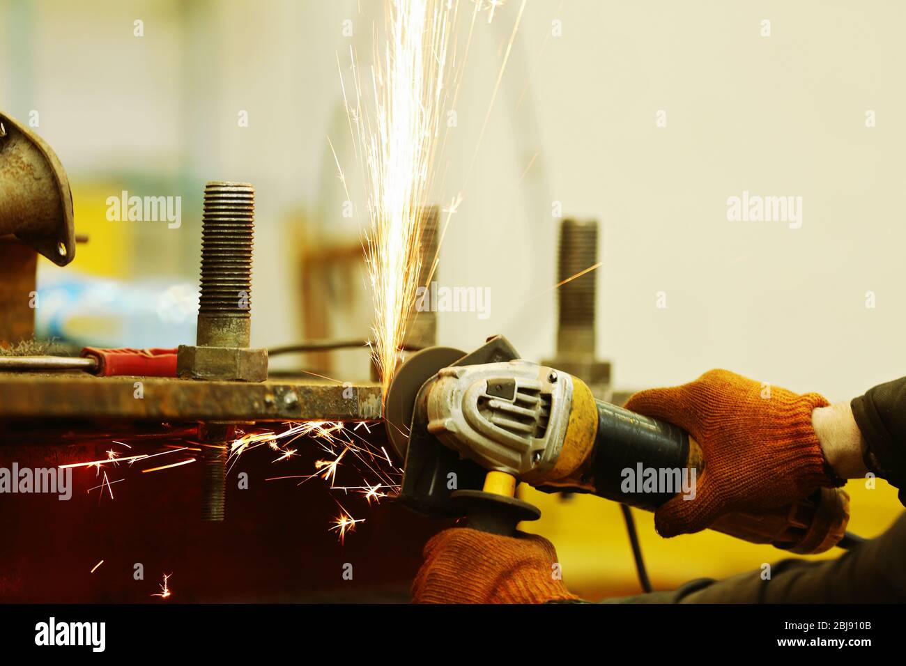 Man holding angle grinder hi-res stock photography and images - Alamy