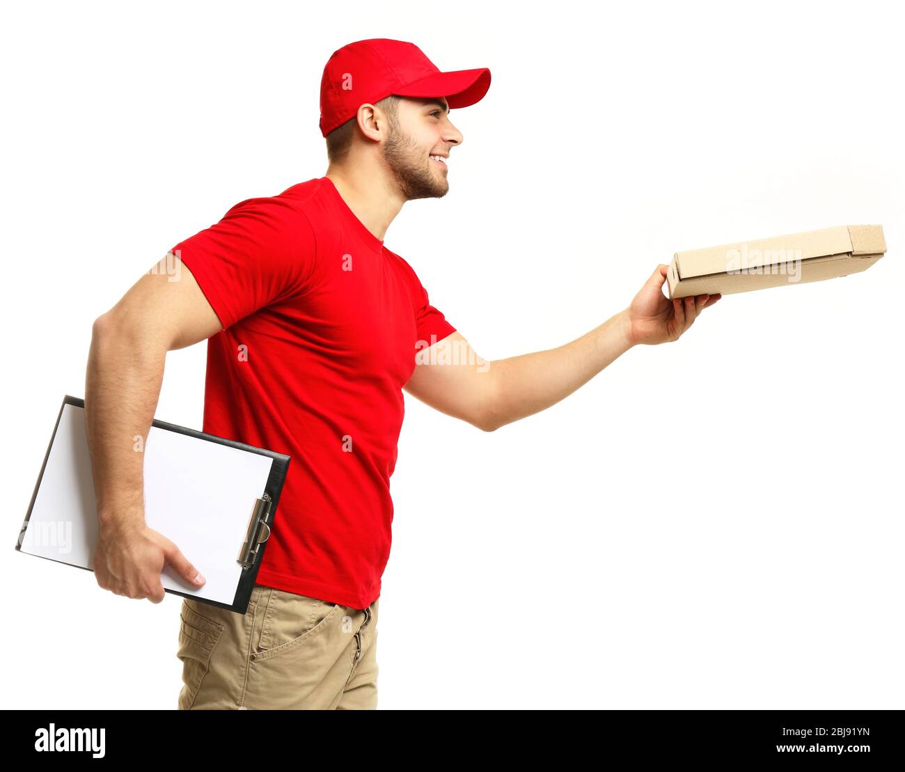 Young man giving pizza isolated on white Stock Photo - Alamy