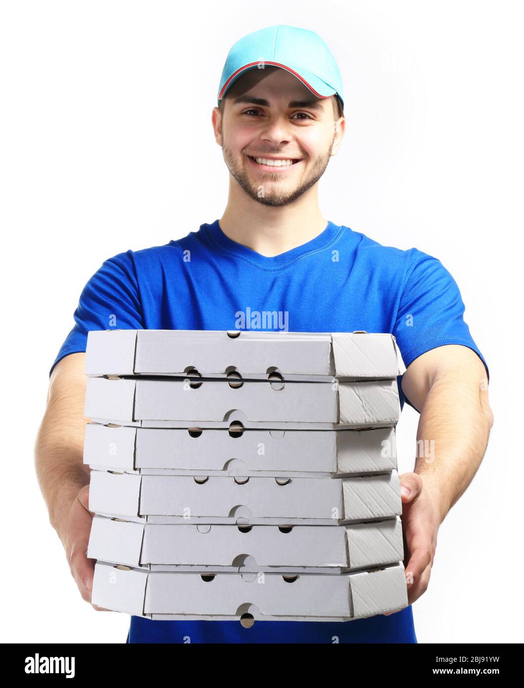 Young man holding pizza isolated on white Stock Photo - Alamy