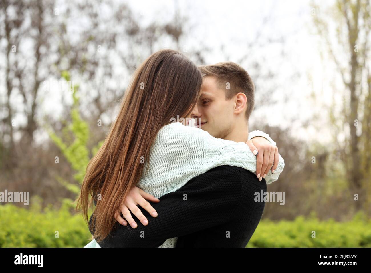 Two black lovers hugging hi-res stock photography and images - Alamy