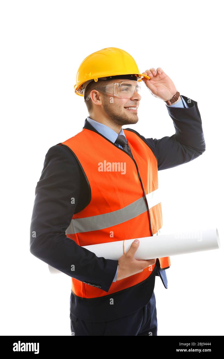Engineer in vest and helmet holding blueprint isolated on white Stock ...
