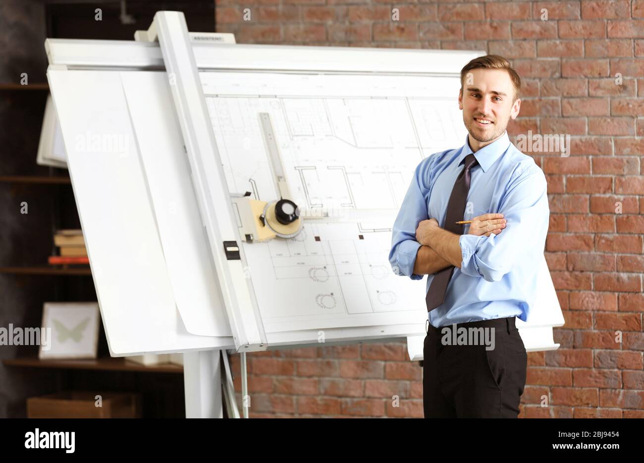 Engineer working with panel board indoors Stock Photo - Alamy