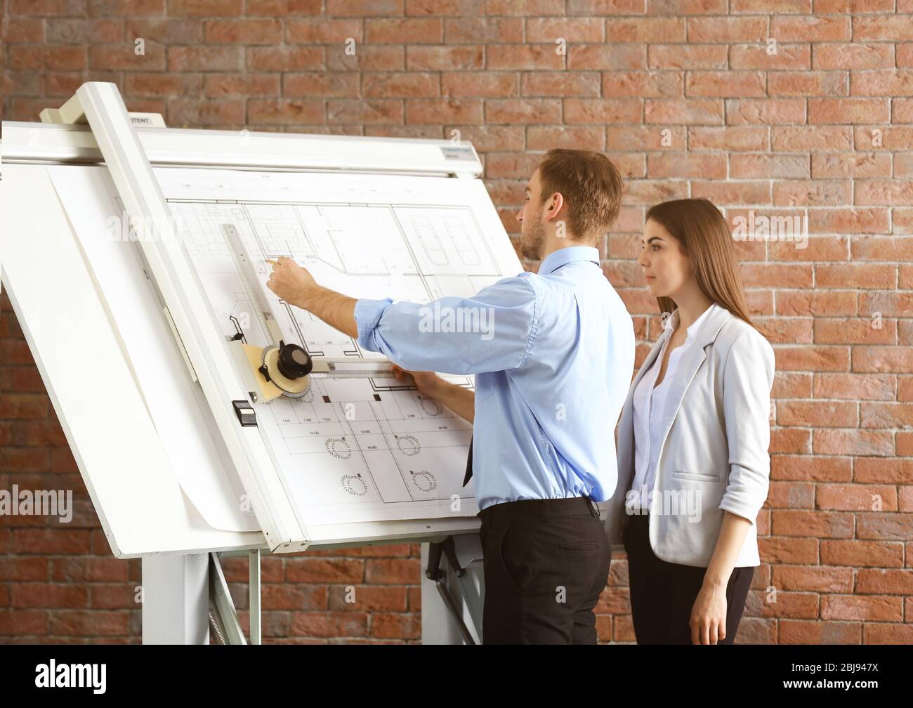 Engineers working at drawing board hi-res stock photography and images ...