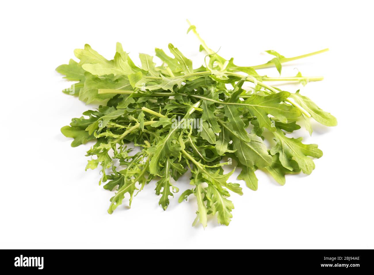 Fresh arugula leaves on white background Stock Photo - Alamy