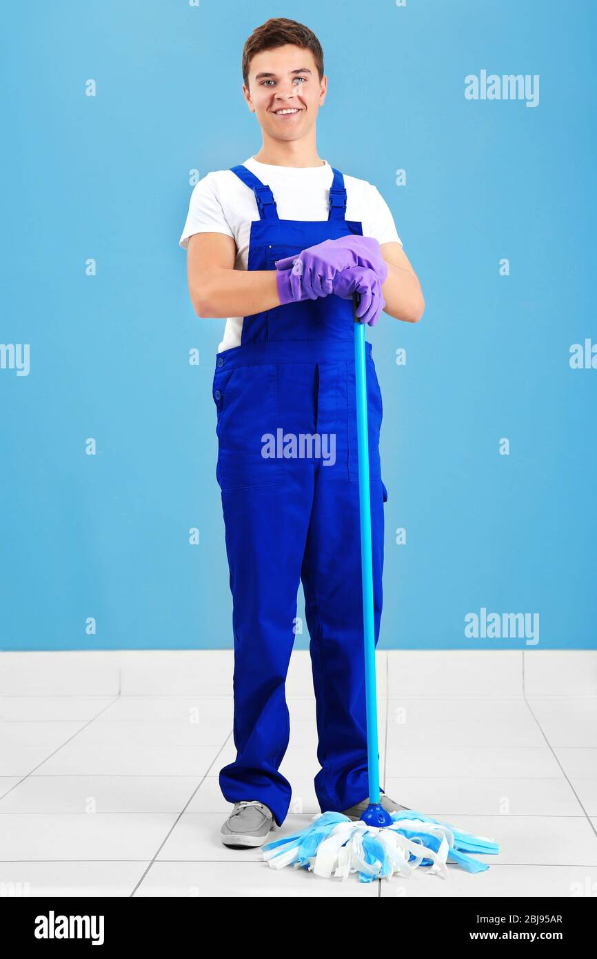 Hand holding mop hi-res stock photography and images - Alamy