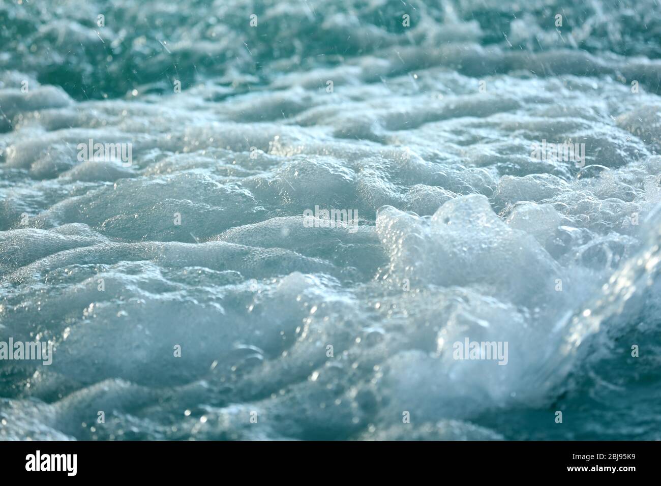 Rippled water in swimming pool Stock Photo - Alamy