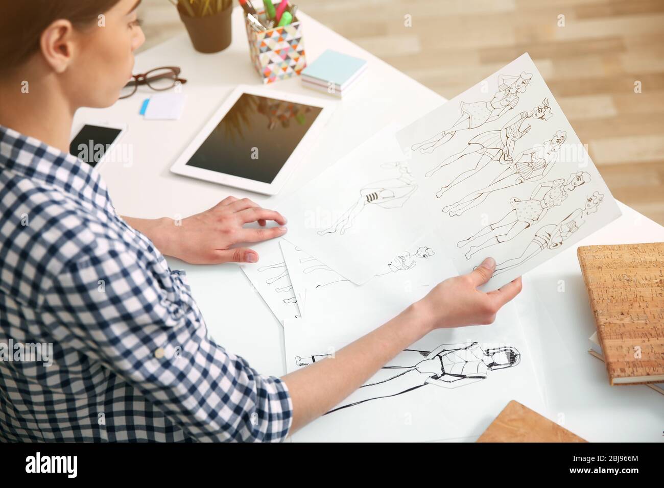 Woman working sketches office hi-res stock photography and images - Alamy