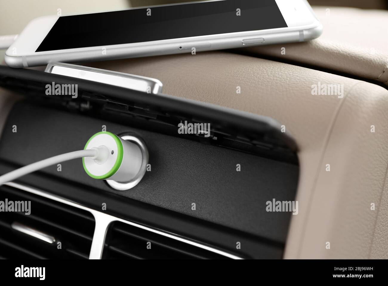 Power plug phone in car Stock Photo - Alamy
