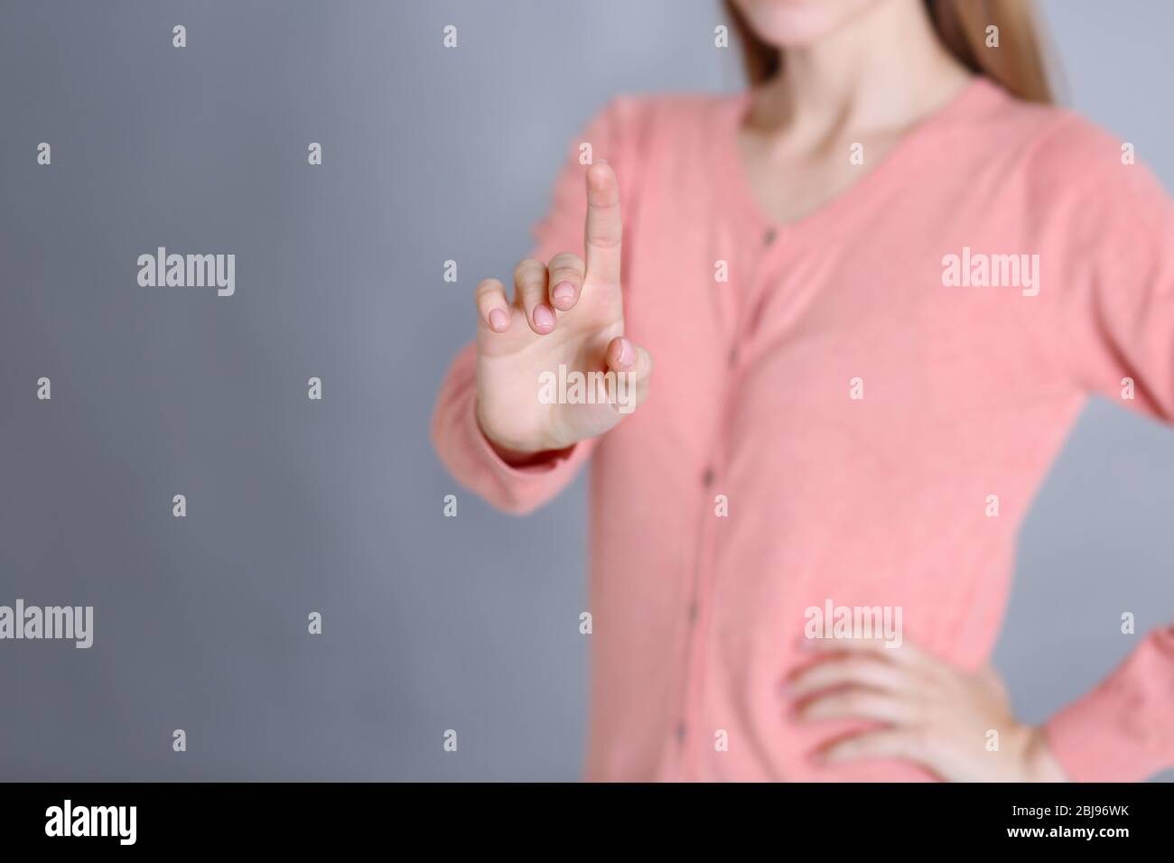 Hands touching virtual button hi-res stock photography and images - Alamy