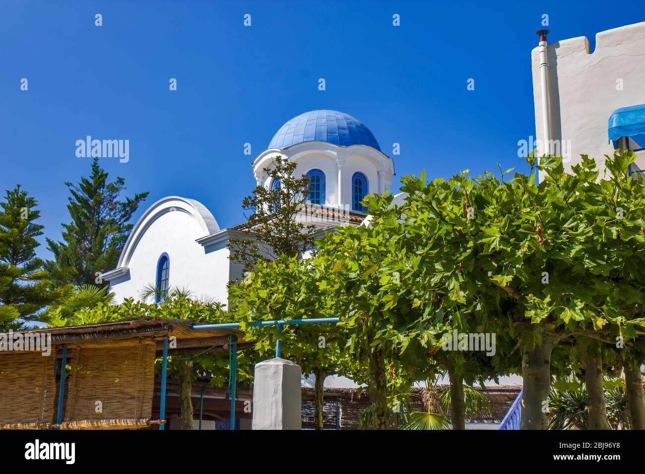 Traditional greek ambient with blue sky Stock Photo - Alamy