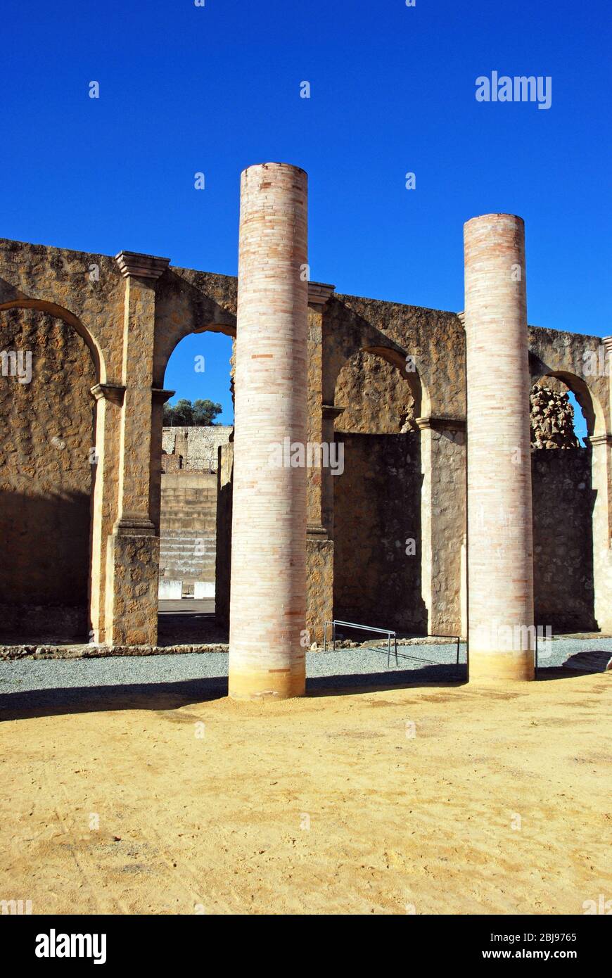 Columns and arches of the Roman theatre, Santiponce, Italica, Seville ...
