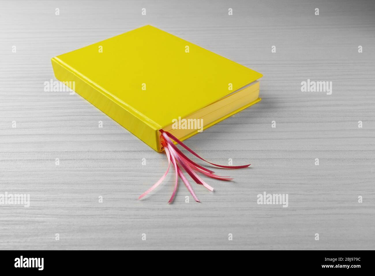 Notebook with bookmarks on wooden background Stock Photo - Alamy