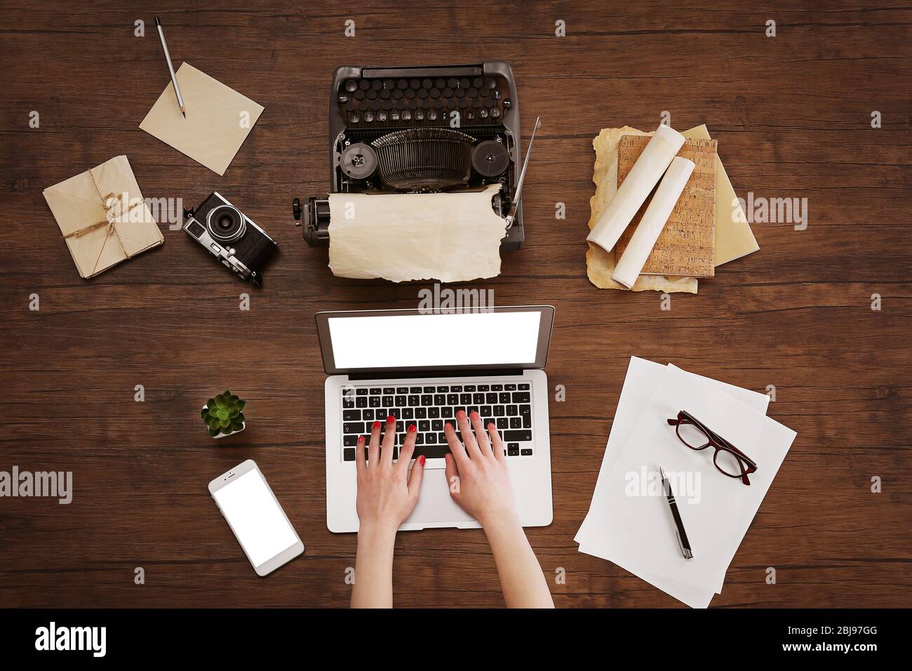 Old typewriter and laptop. Concept of technology progress Stock Photo ...