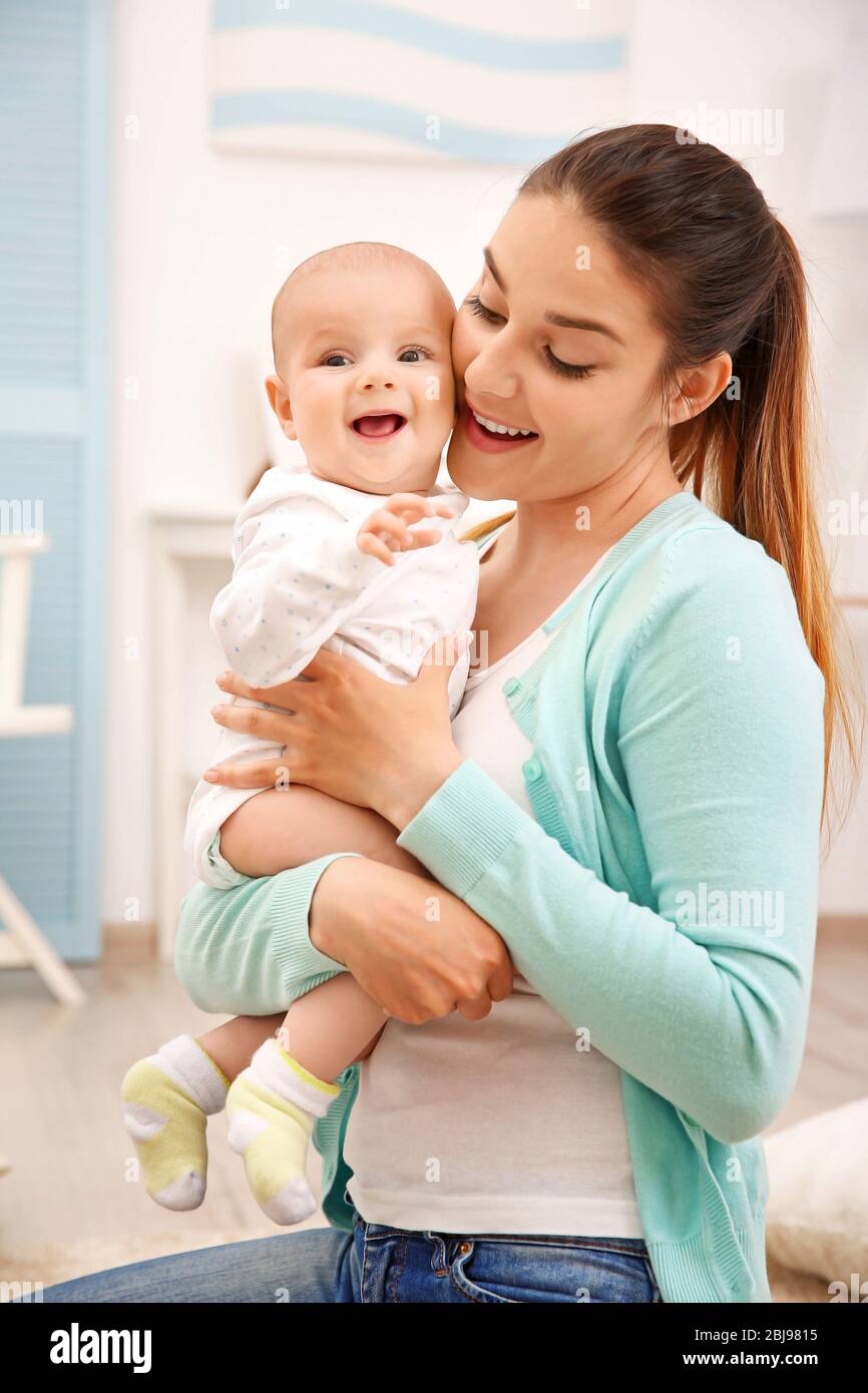 Mother and her little baby at home Stock Photo - Alamy
