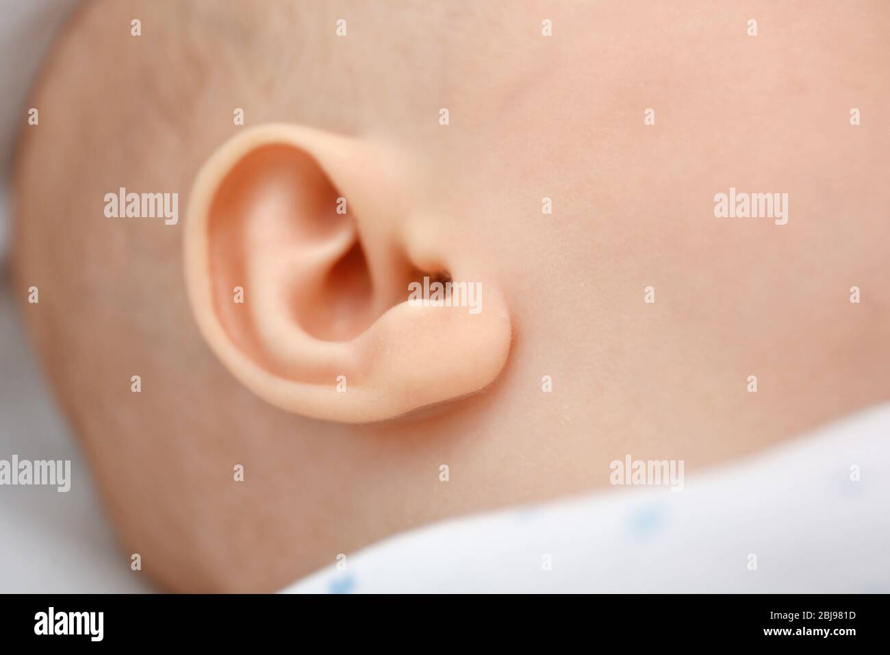 Ear of a little baby closeup Stock Photo - Alamy