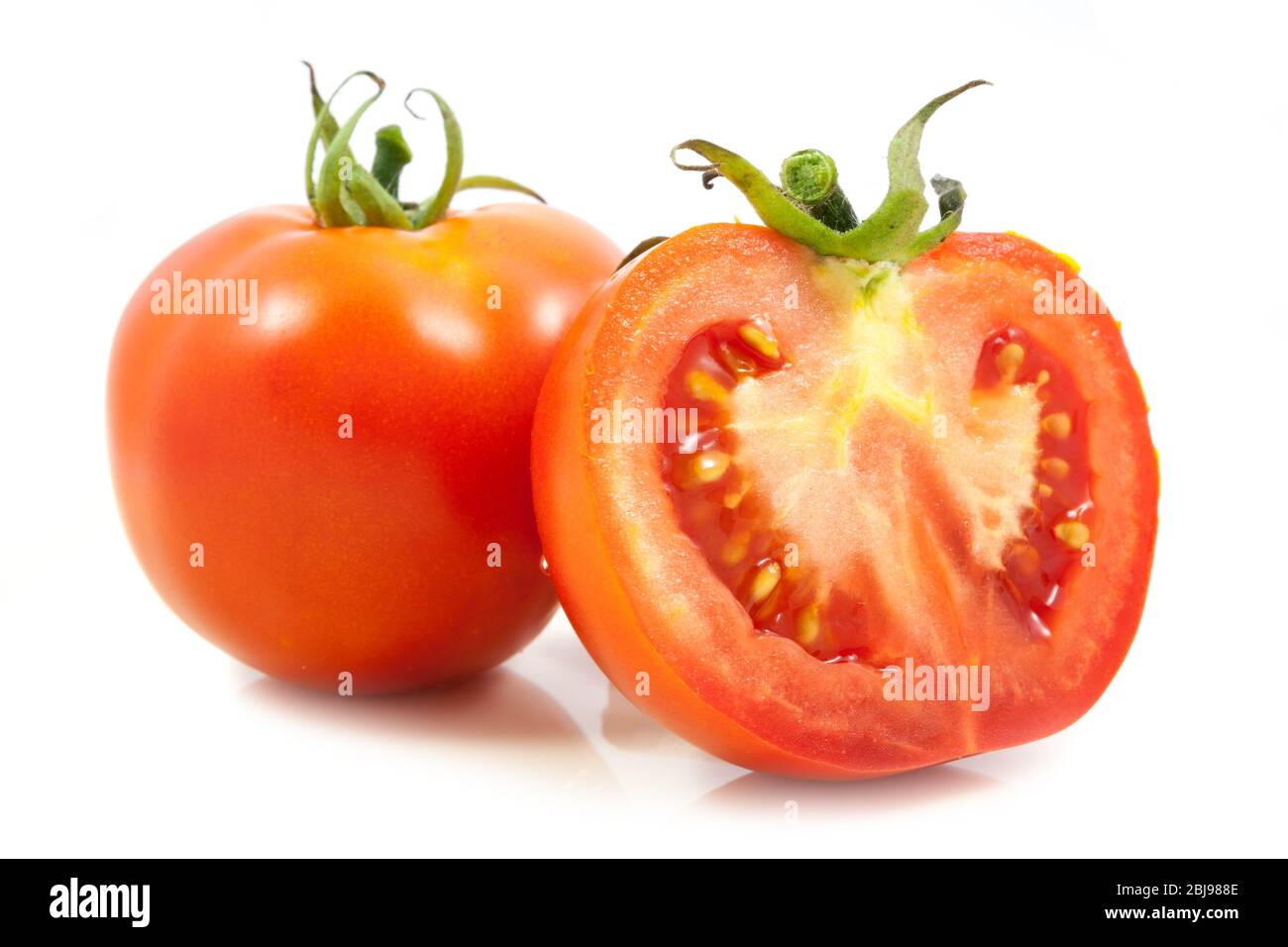 tomato half slice isolated on white background Stock Photo - Alamy