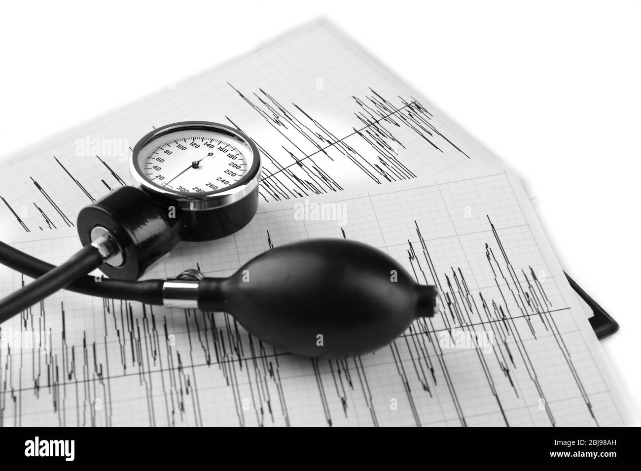 Medical manometer lying on cardiogram chart close up Stock Photo - Alamy