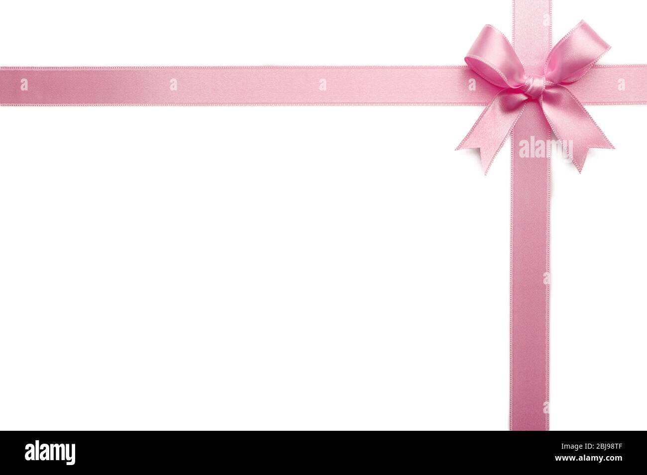 Pink ribbon bow on white background Stock Photo - Alamy