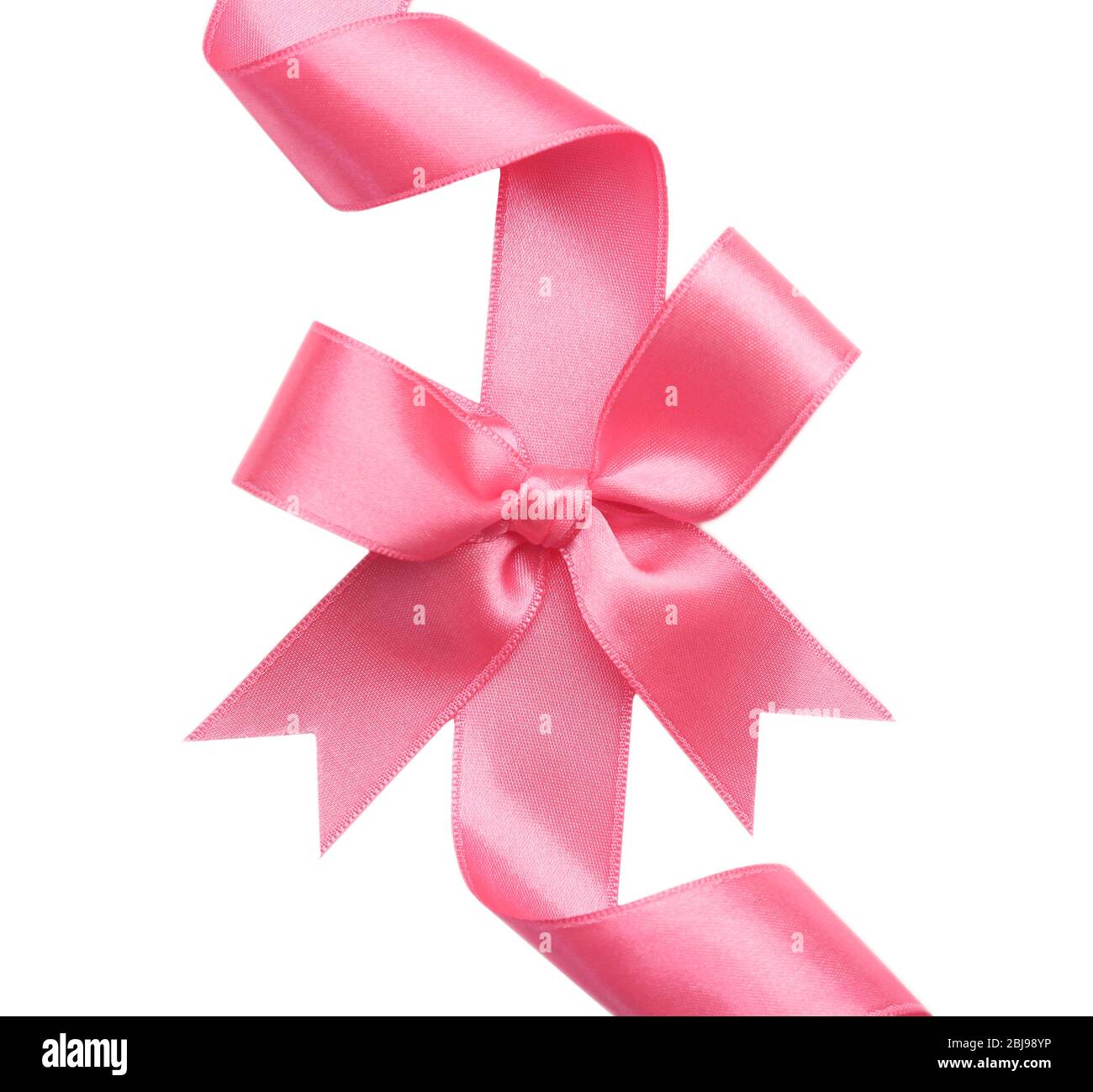 Pink ribbon with bow on white background Stock Photo - Alamy
